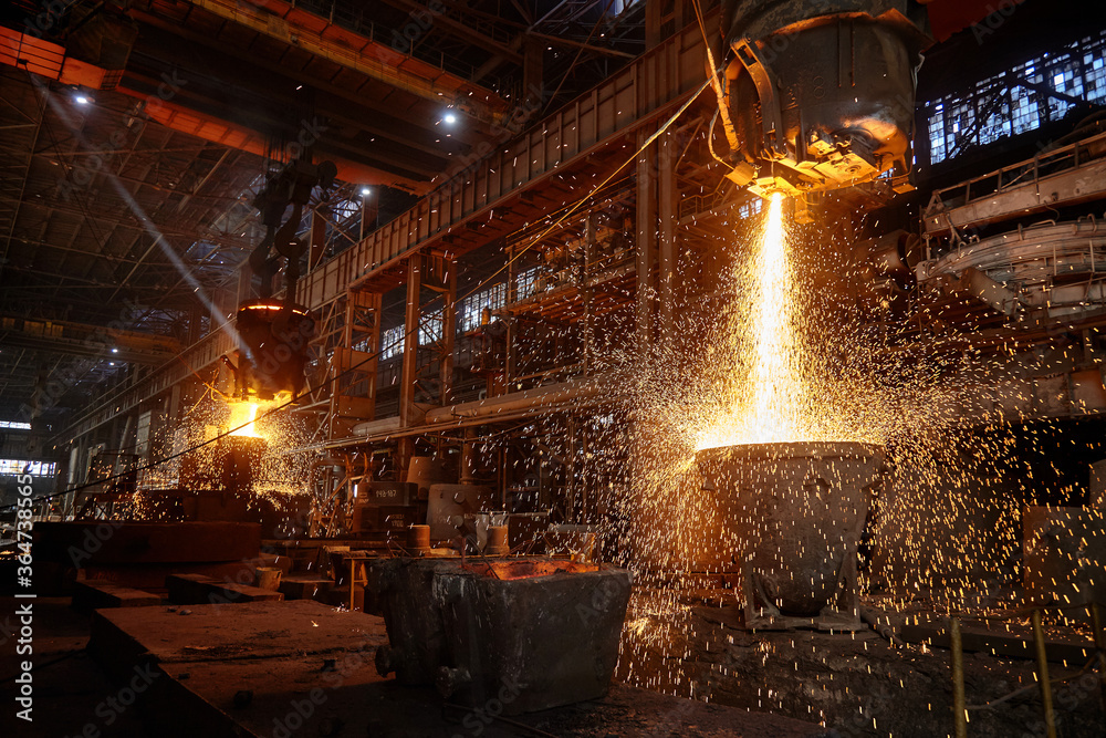 Foto de Metallurgy. Casting ingot. Electric arc furnace shop. do Stock ...