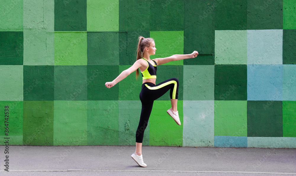 Fitness sport young girl in sportswear doing yoga fitness exercise on a ...