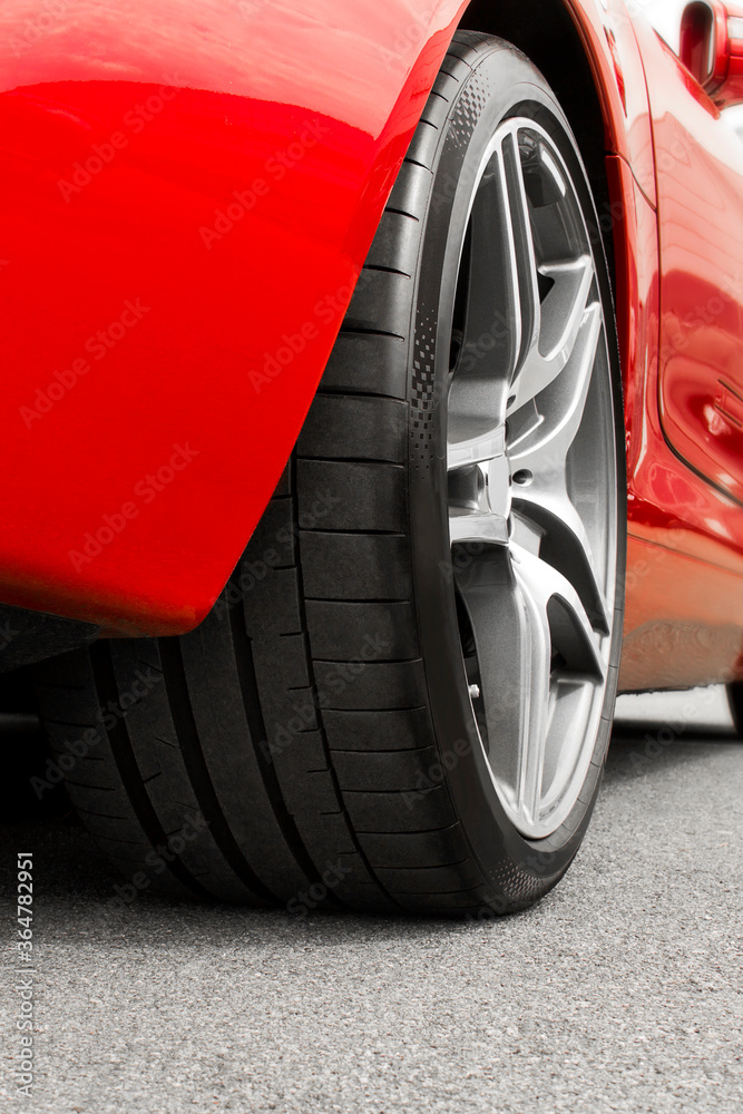 Car wheels on asphalt background. Car tires. Car wheels close up ...