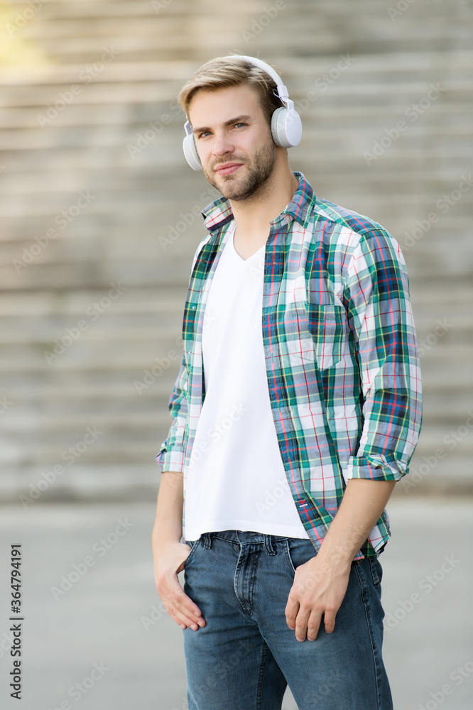 Audio only for your ears. Handsome guy wear audio headphones. Young man ...