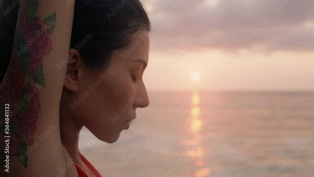 Asian girl doing breathing exercises. Portrait woman face relaxing ...