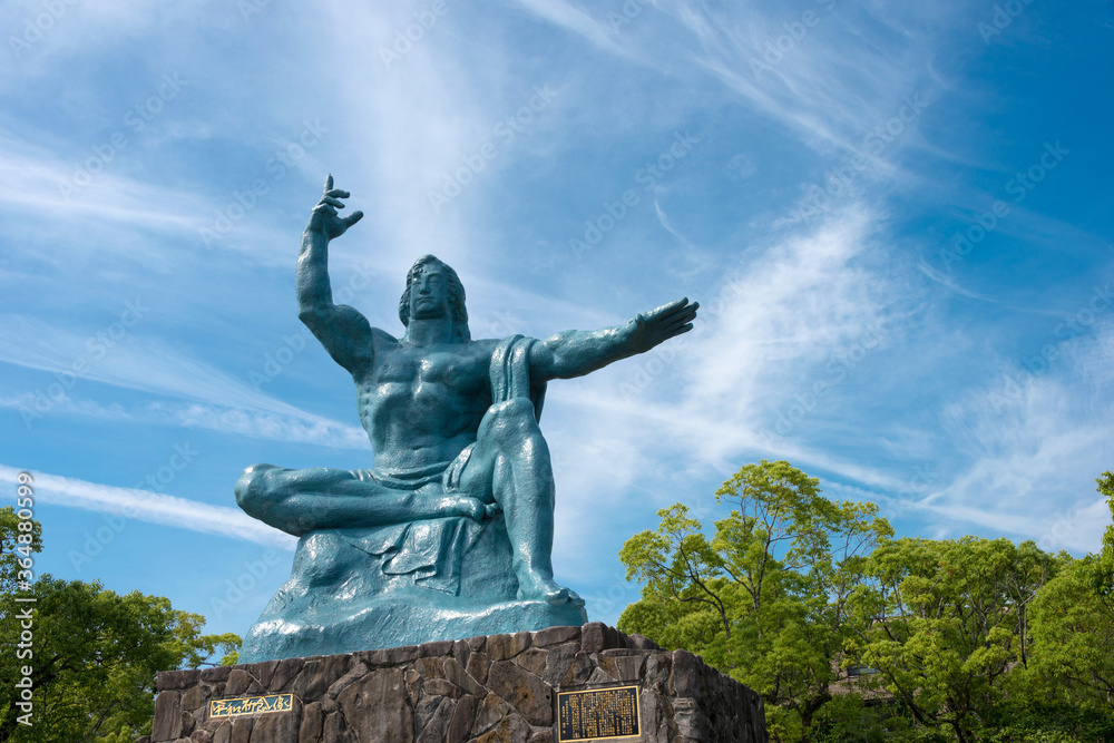 Peace Statue at Nagasaki Peace Park in Nagasaki, Japan. The Peace Park ...