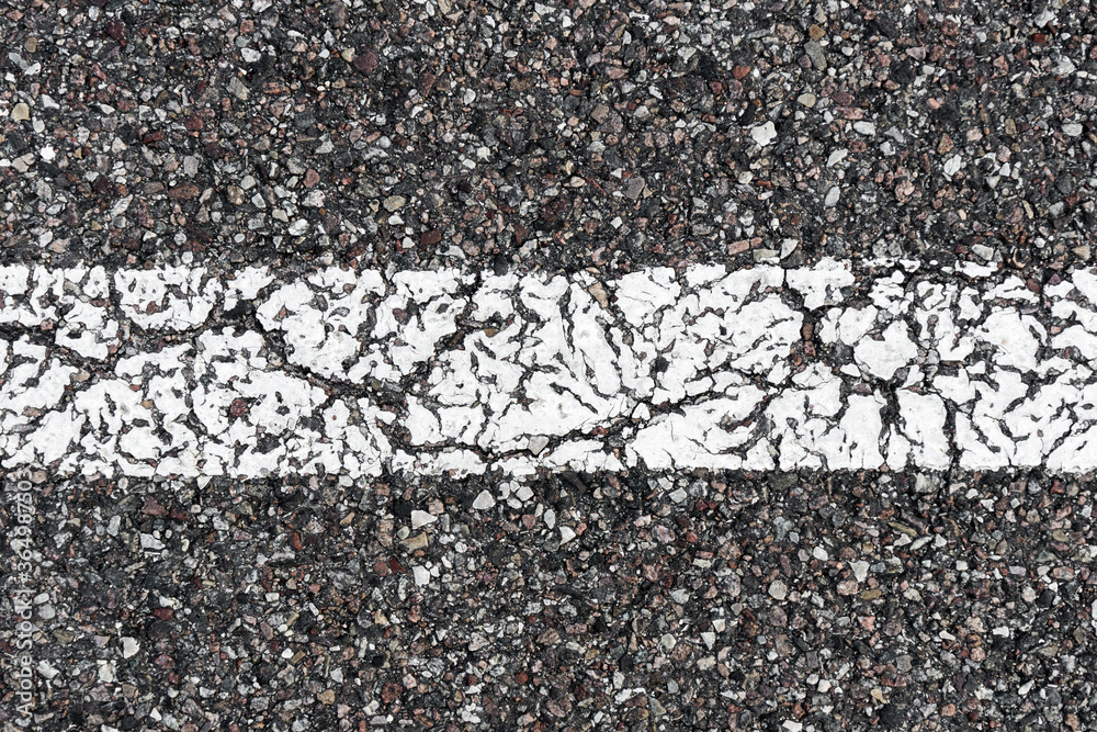 White paint line. Grunge asphalt structure texture. Closeup granular ...