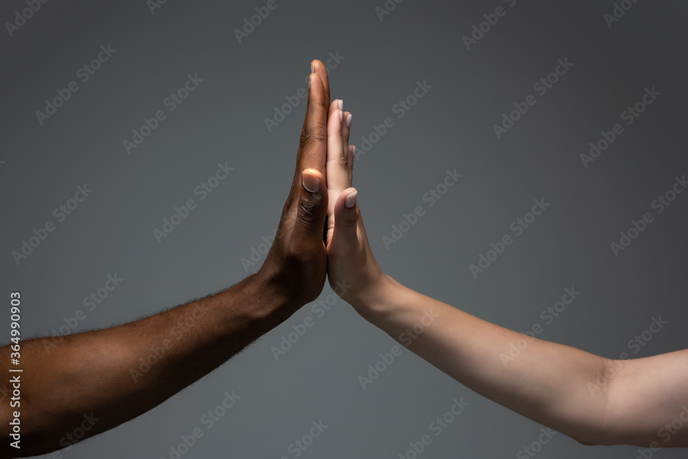 Clapping, teamwork. Racial tolerance. Respect social unity. African and ...