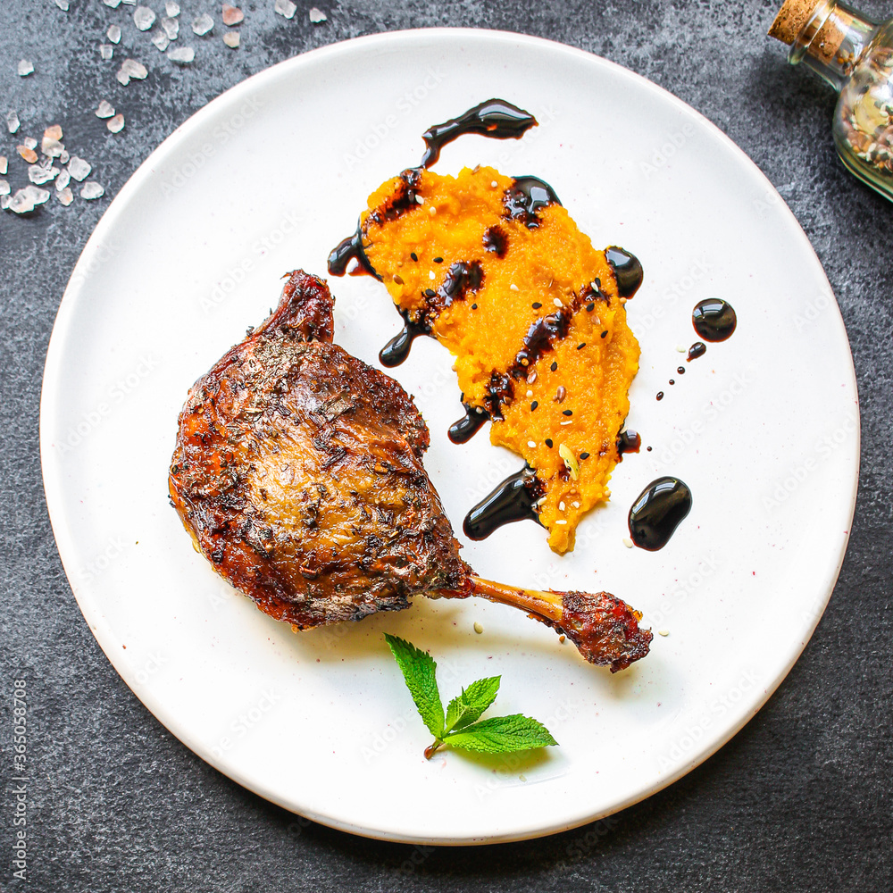 duck leg confit meat portion of prepared food Menu concept serving size ...