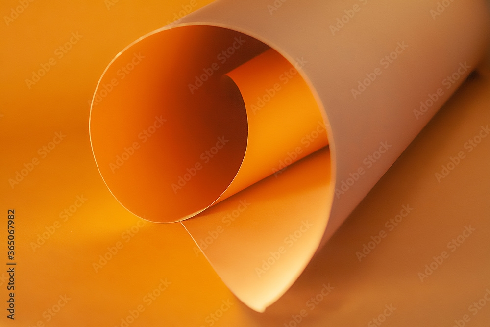 Orange and brown paper is curved by a wavy line, beautiful soft light ...