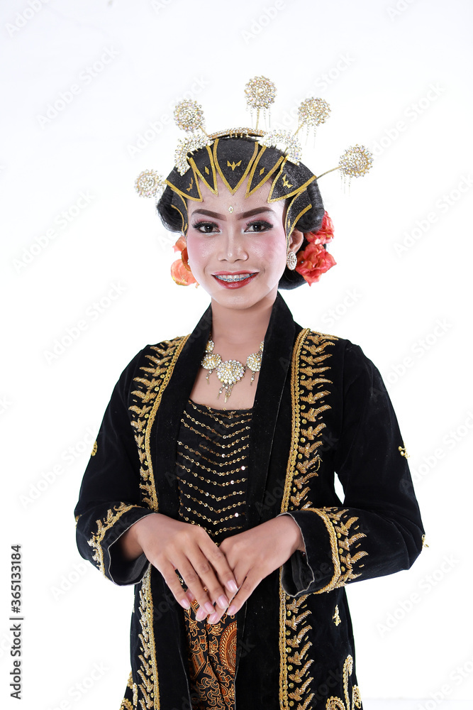 Beautiful smiling Asian girl wearing a set of modern traditional ...