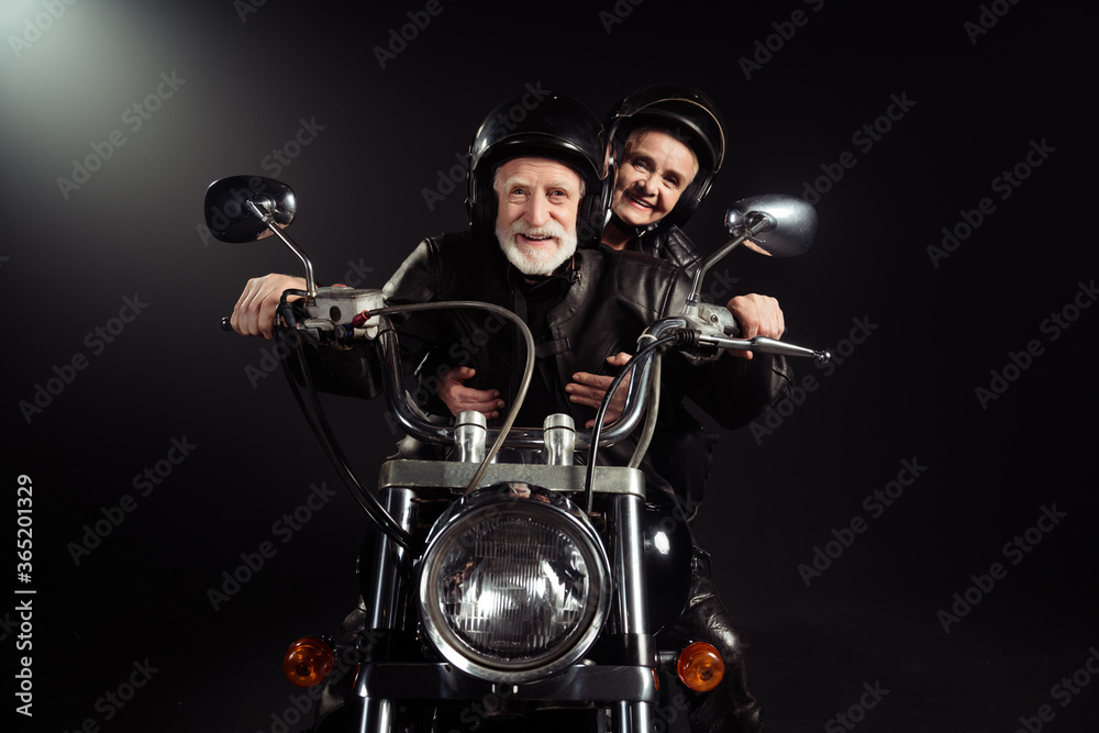 Portrait of old cool man drive chopper motor bike ride his wife enjoy ...
