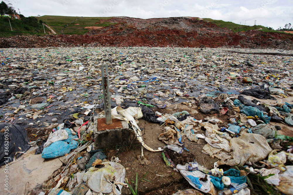 Piles of trash are seen in a public landfill site in Sao Paulo, Brazil ...