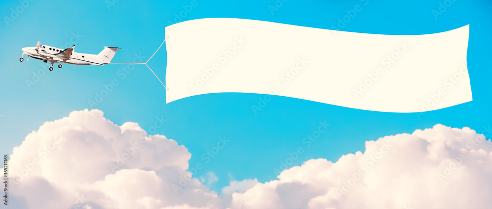 Plane with white banner Stock Photo | Adobe Stock