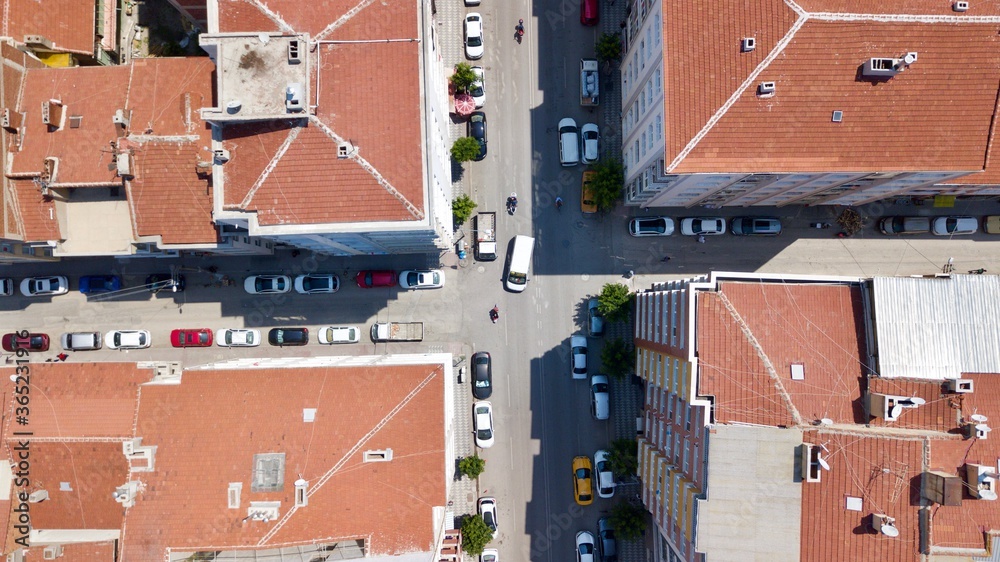 Aerial view of intersection road at the city center. Vehicles, traffic ...