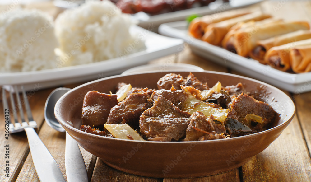bowl of filipino pork adobo with rice Stock Photo | Adobe Stock