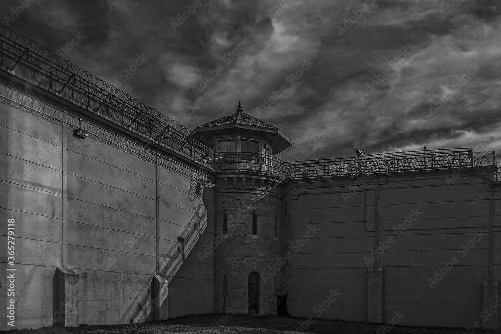 Kingston Penitentiary at night inside prison yard moonlight high stone ...