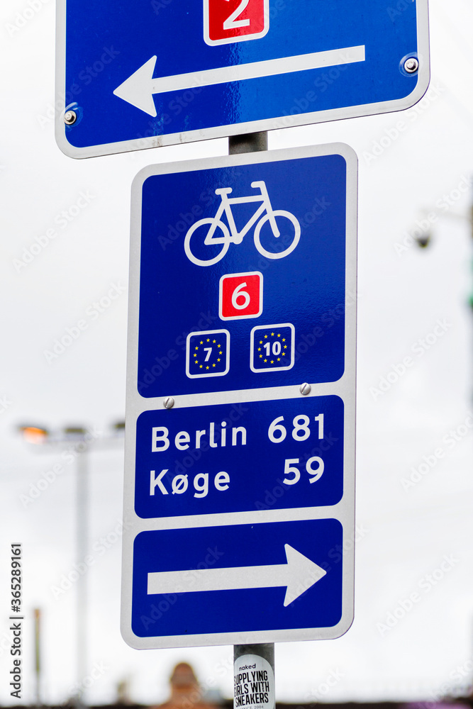Cycling sign in Copenhagen, Denmark with direction to Berlin, Germany ...