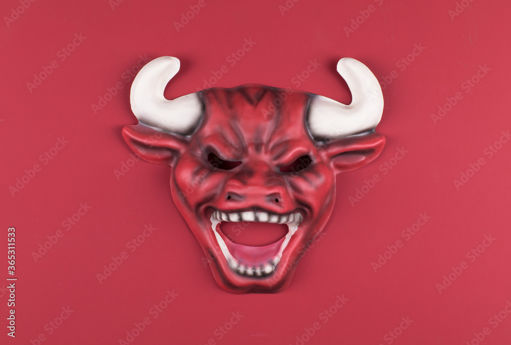 red bull mask on red background Stock Photo | Adobe Stock