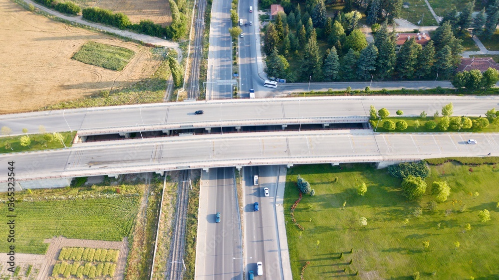Aerial view of two lane bridge driveway. There is an inner ring road at ...