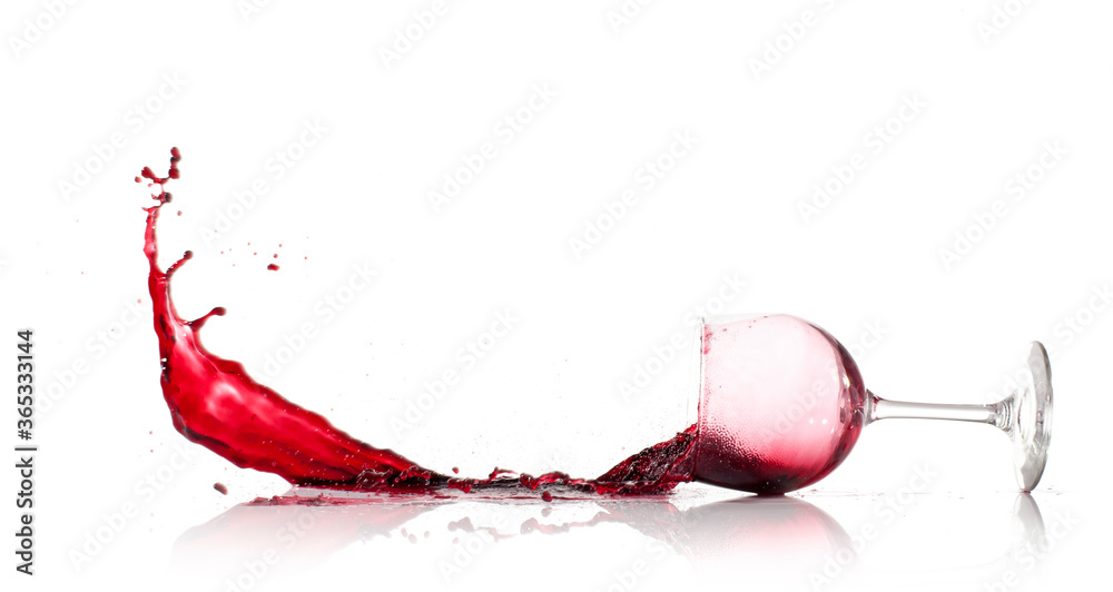 Red Wine Glass dropped and spilling over a white background Stock Photo ...