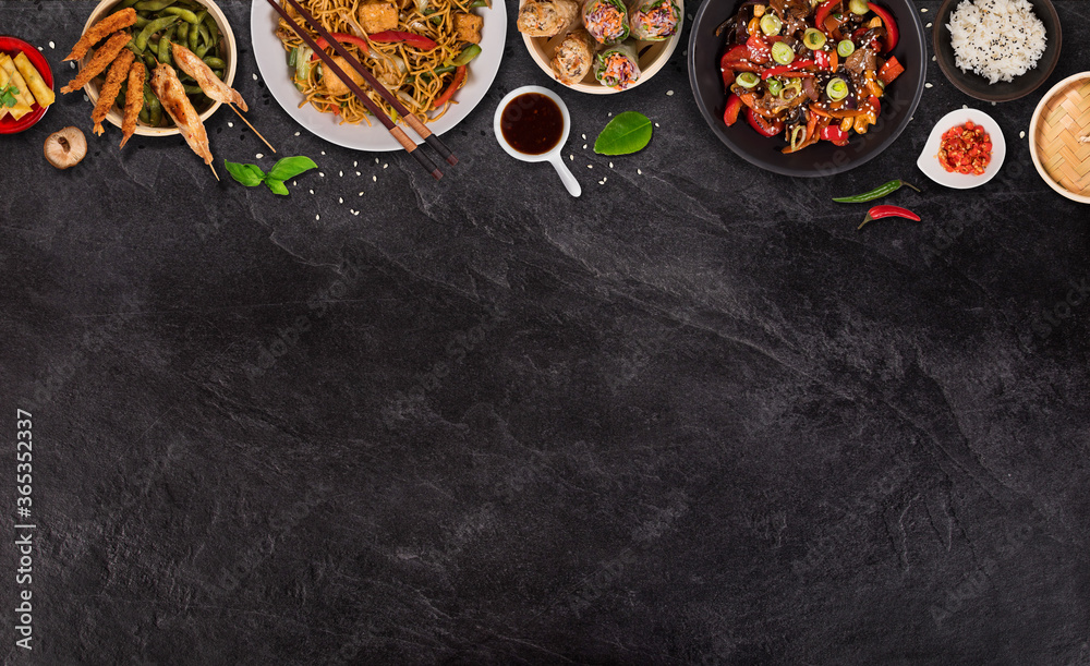 Asian food background with various ingredients on rustic stone ...