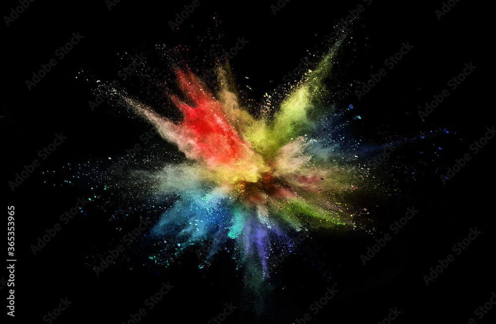 Colored powder explosion on black background. Freeze motion. Stock ...