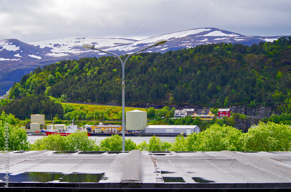 Breathtaking mountain range scenery and landscape with fjord around ...