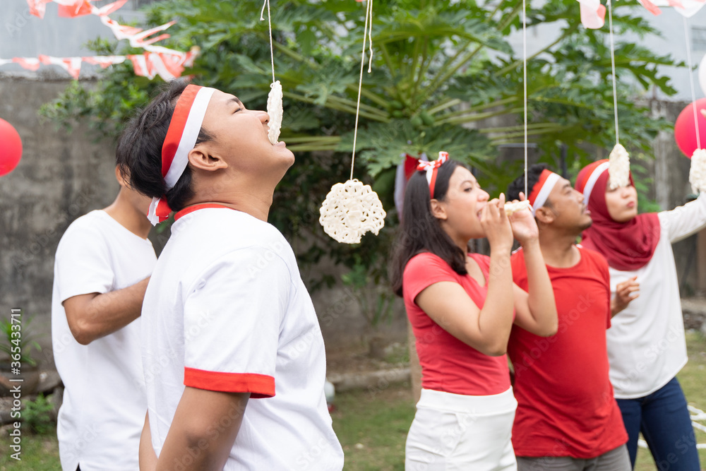 young men and young women competing to spend crackers during the ...
