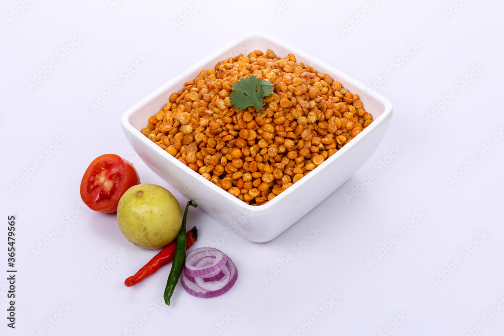 Fried Salted Chana Dal, Snacks for every occasion, white bowl on white ...