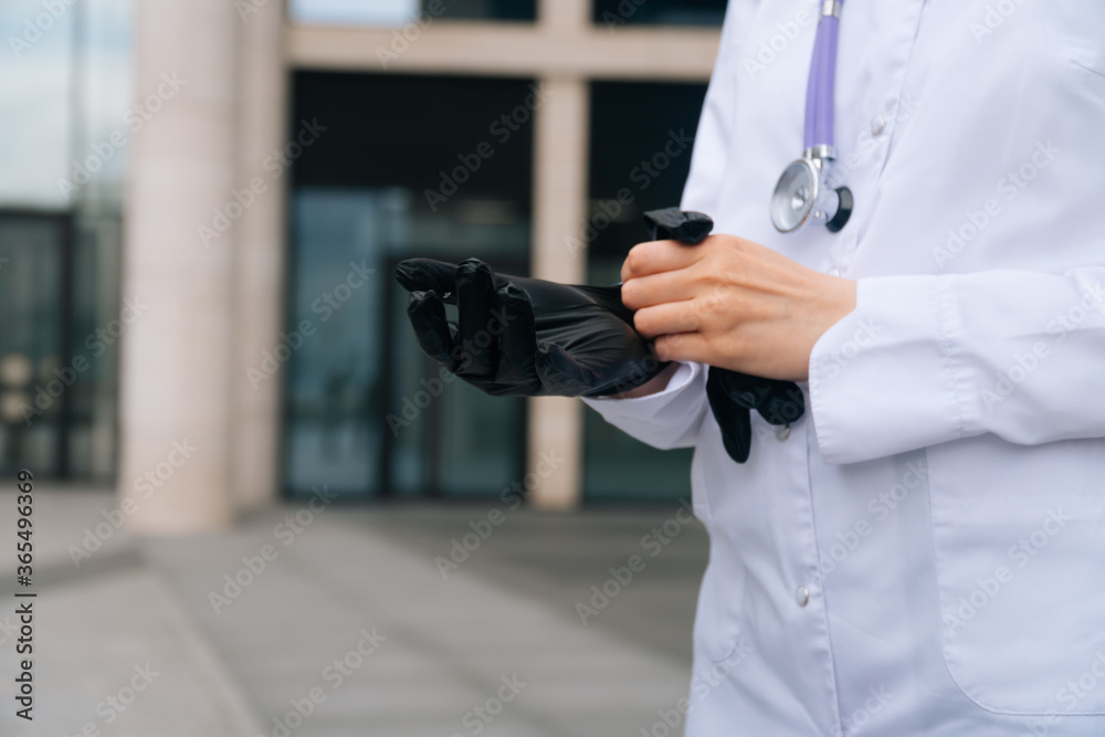 doctors closeup hands don medical gloves, doctor observes hygiene rules ...