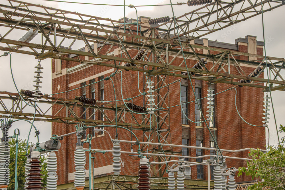 Poster Art Deco red brick electrical substation view from through ...