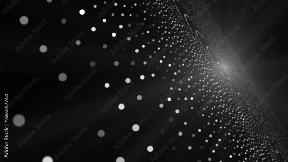 White dots of various sizes and shades grow and shrink in size against ...