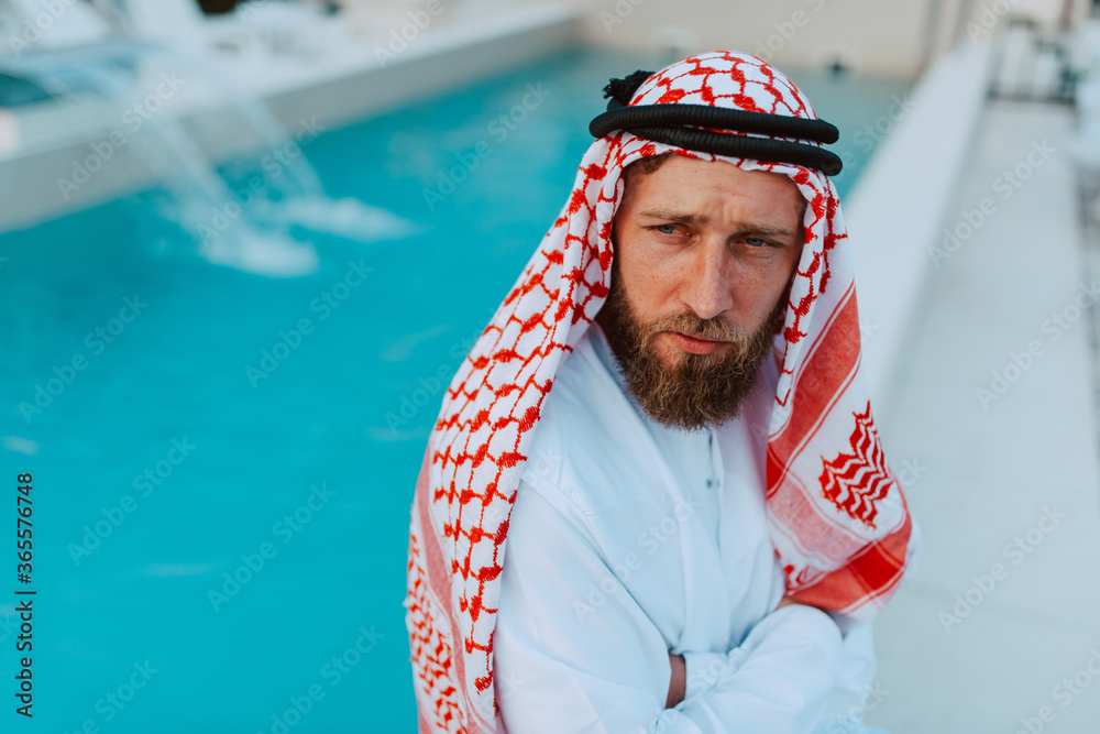 Portrait of handsome middle eastern arab muslim man in traditional ...