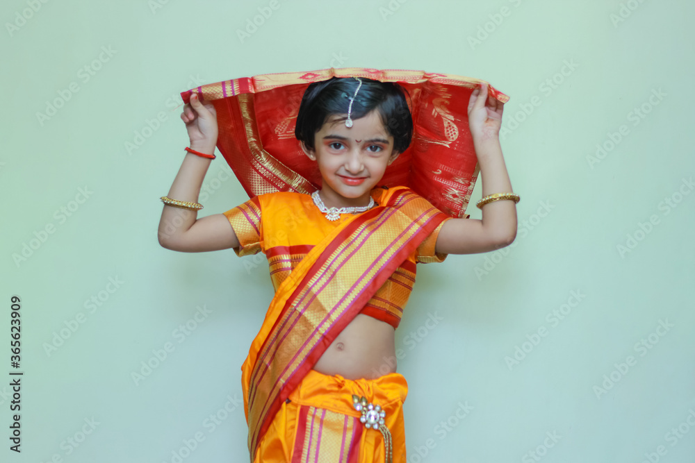 Cute Indian little girl on traditional wear Stock Photo | Adobe Stock