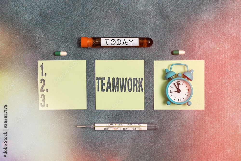 Writing note showing Teamwork. Business concept for the group s is ...