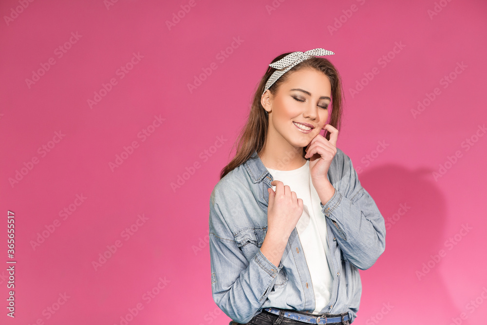 Smiling beautiful pinup girl woman in headband and having fun over ...