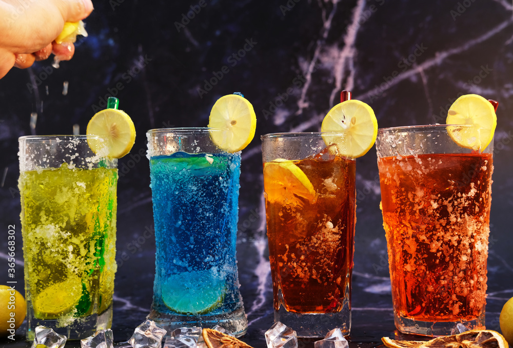 Cocktail and mocktails on table background and space for text, summer ...