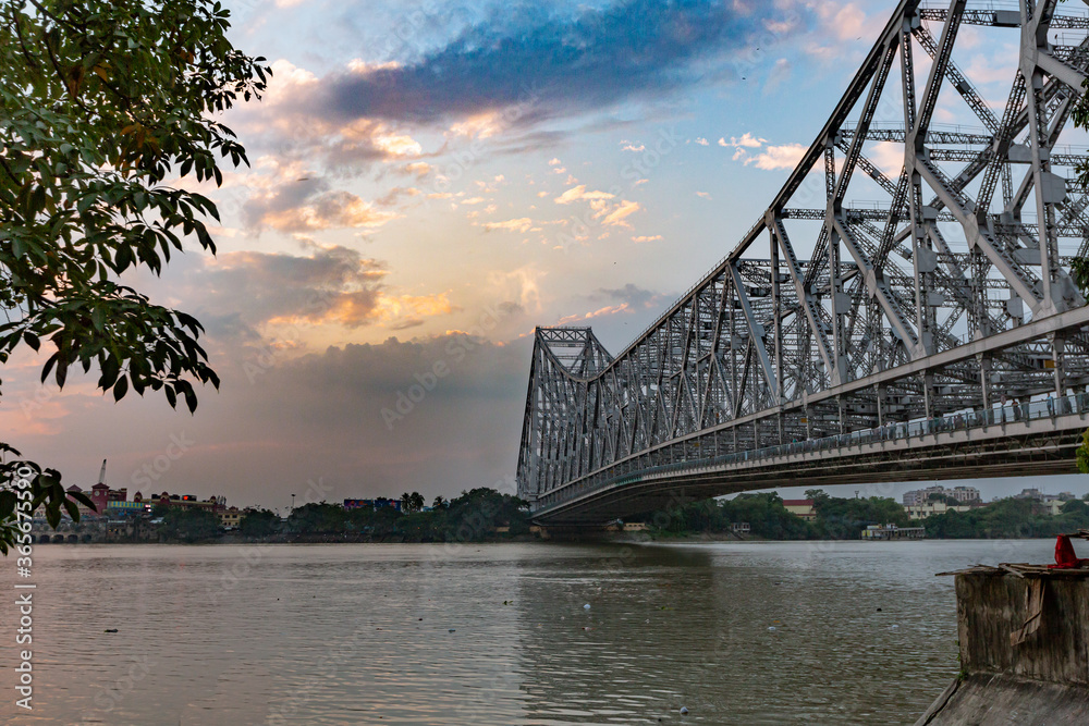 Howrah Bridge is a bridge with a suspended span over the Hooghly River ...