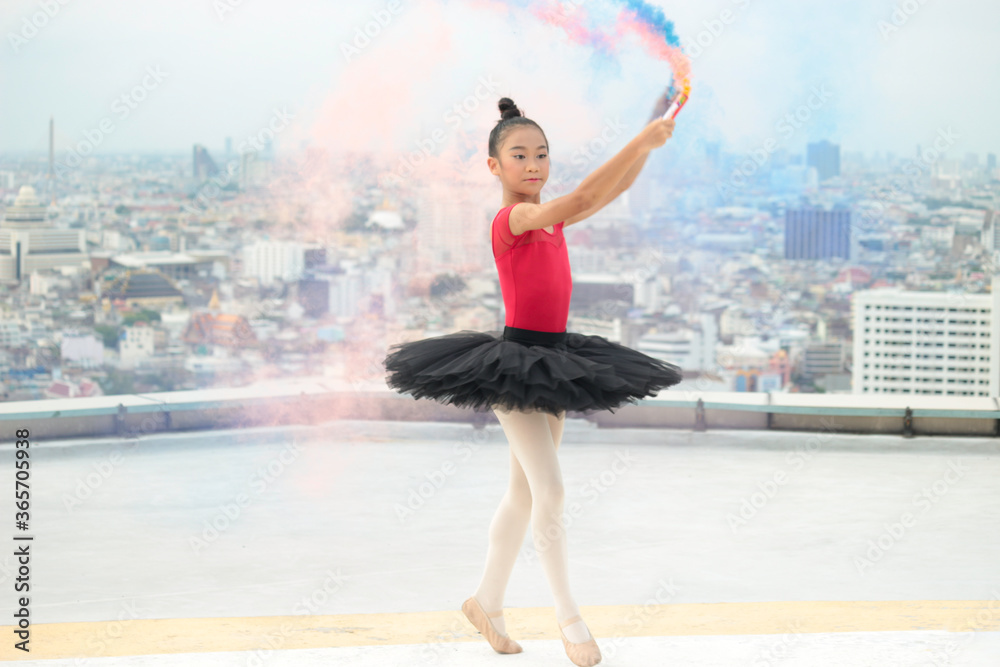Asian ballerina dancer girl practicing ballet dancing with colored ...
