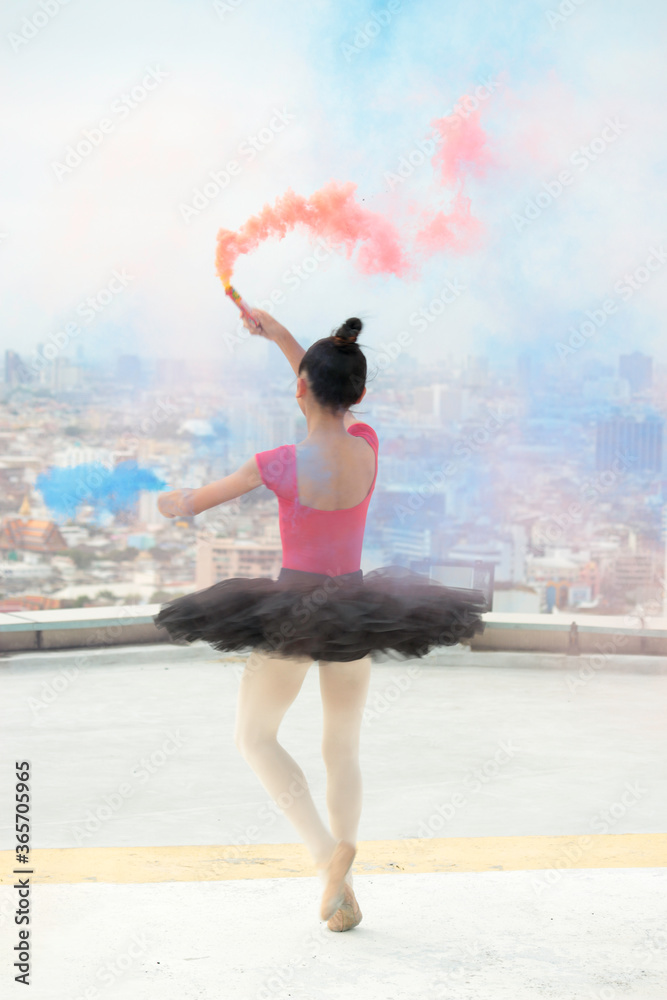 Asian ballerina dancer girl practicing ballet dancing with colored ...