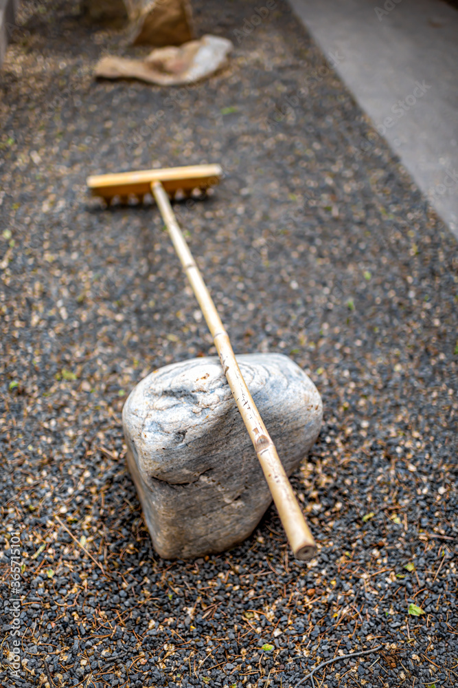 Outdoor small zen rock garden in Japan temple with rake closeup on ...