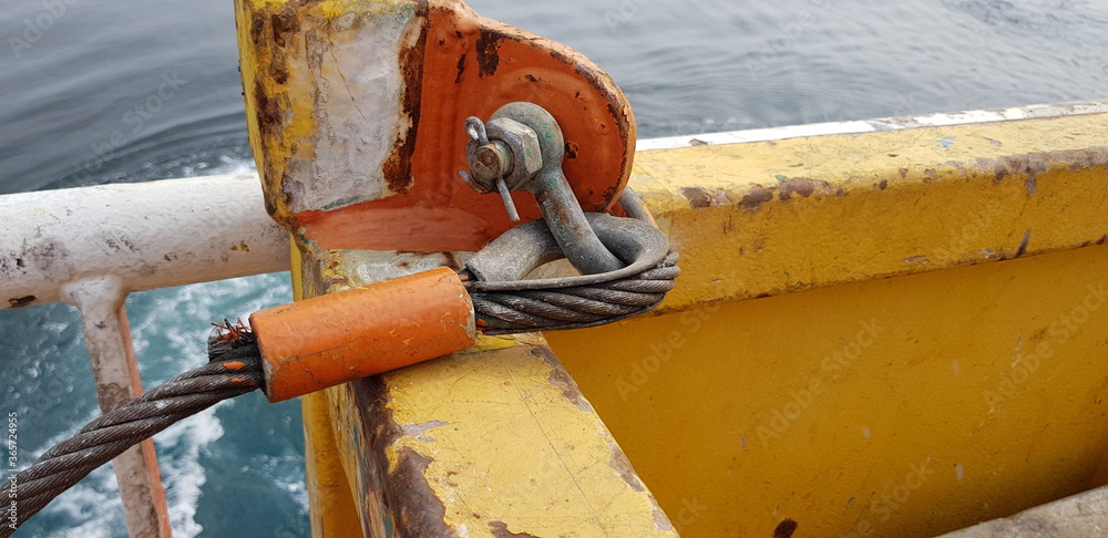 view of pad eyes attached with shackles, safety pin and sling wire on ...