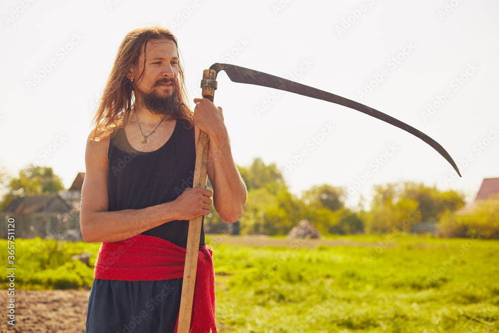 Rural farmer on summer meadow mowing grass with classic scythe ...
