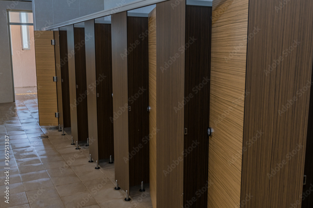 Public restroom toilet stalls Stock Photo | Adobe Stock