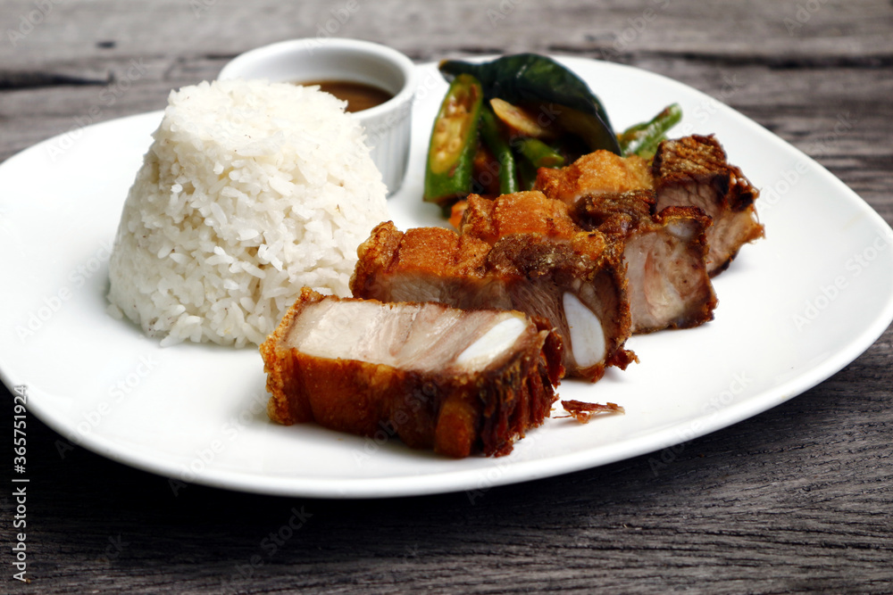 Filipino food called Lechon Kawali or crispy deep fried pork with rice ...