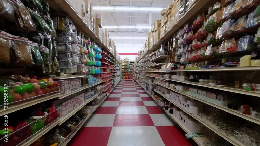 Supermarket shopping pov action camera motion in the row of the store ...