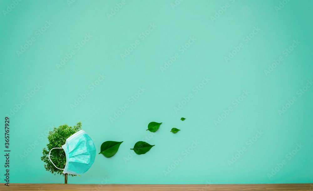 Concept tree wearing a mask to protect environment Stock Photo | Adobe ...