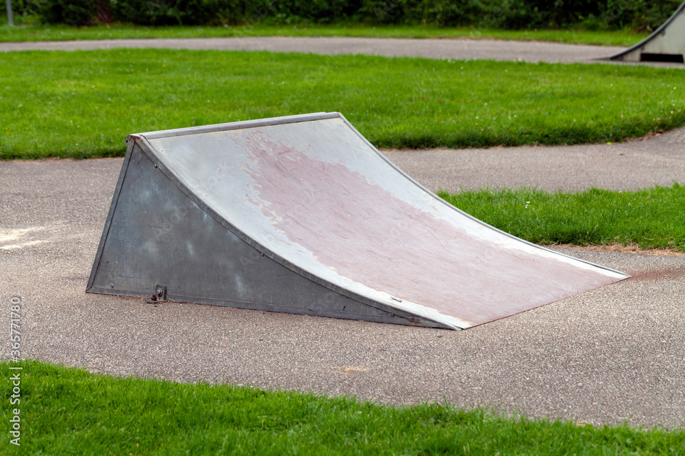 Close up of a skateboarding ramp on an empty circuit with a concrete ...