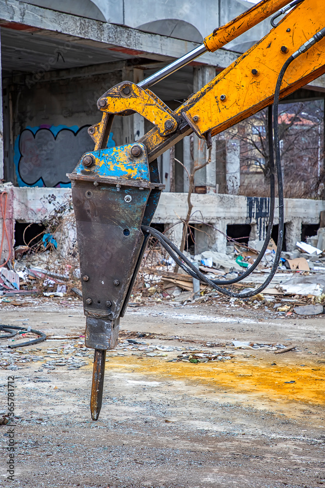 Arm of excavator with hydraulic breaker hammer for the destruction of ...