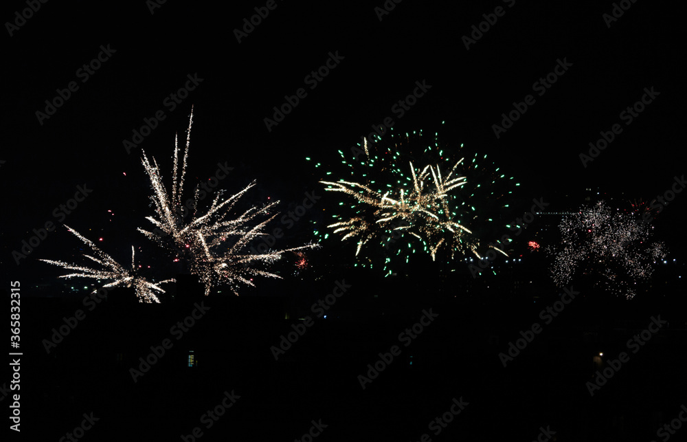 spider rockets and chrysanthemum rocket fireworks exploding as seen ...