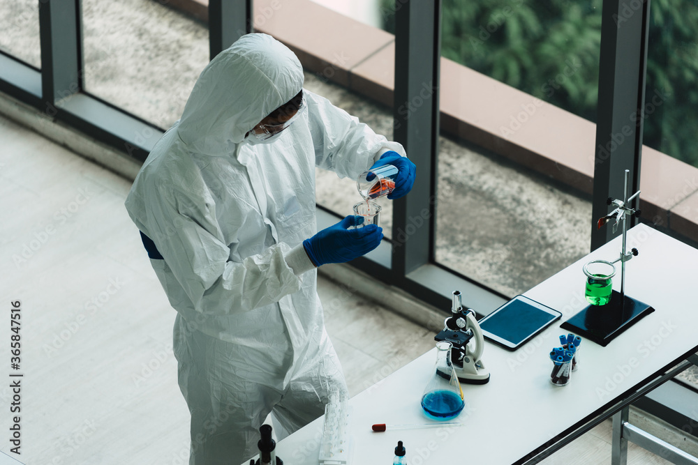 Lab Technicians in Personal protective equipment PPE suit Vaccines ...