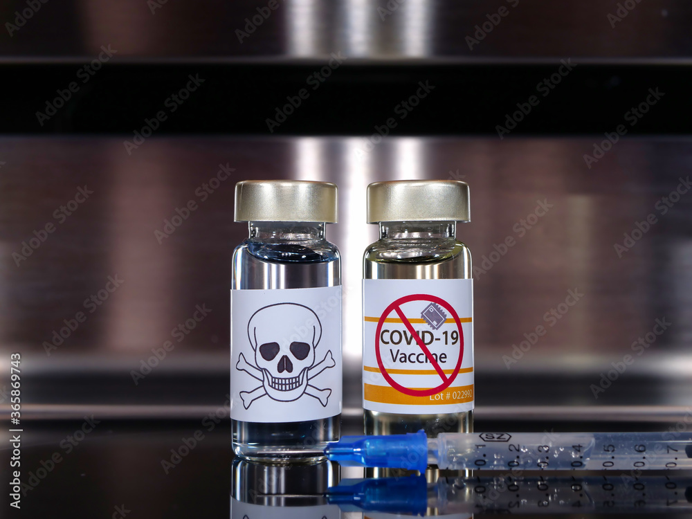 Two bottle one with a skull and one vial vaccine anti-vax Stock Photo ...
