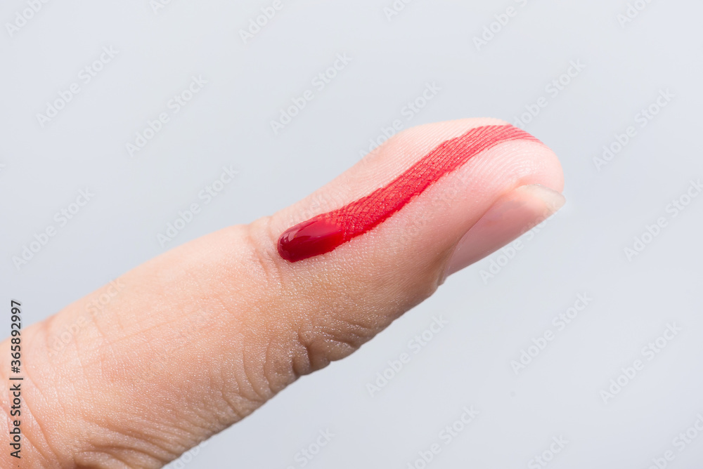 Bleeding blood from the cut finger wound. Injured finger with bleeding ...